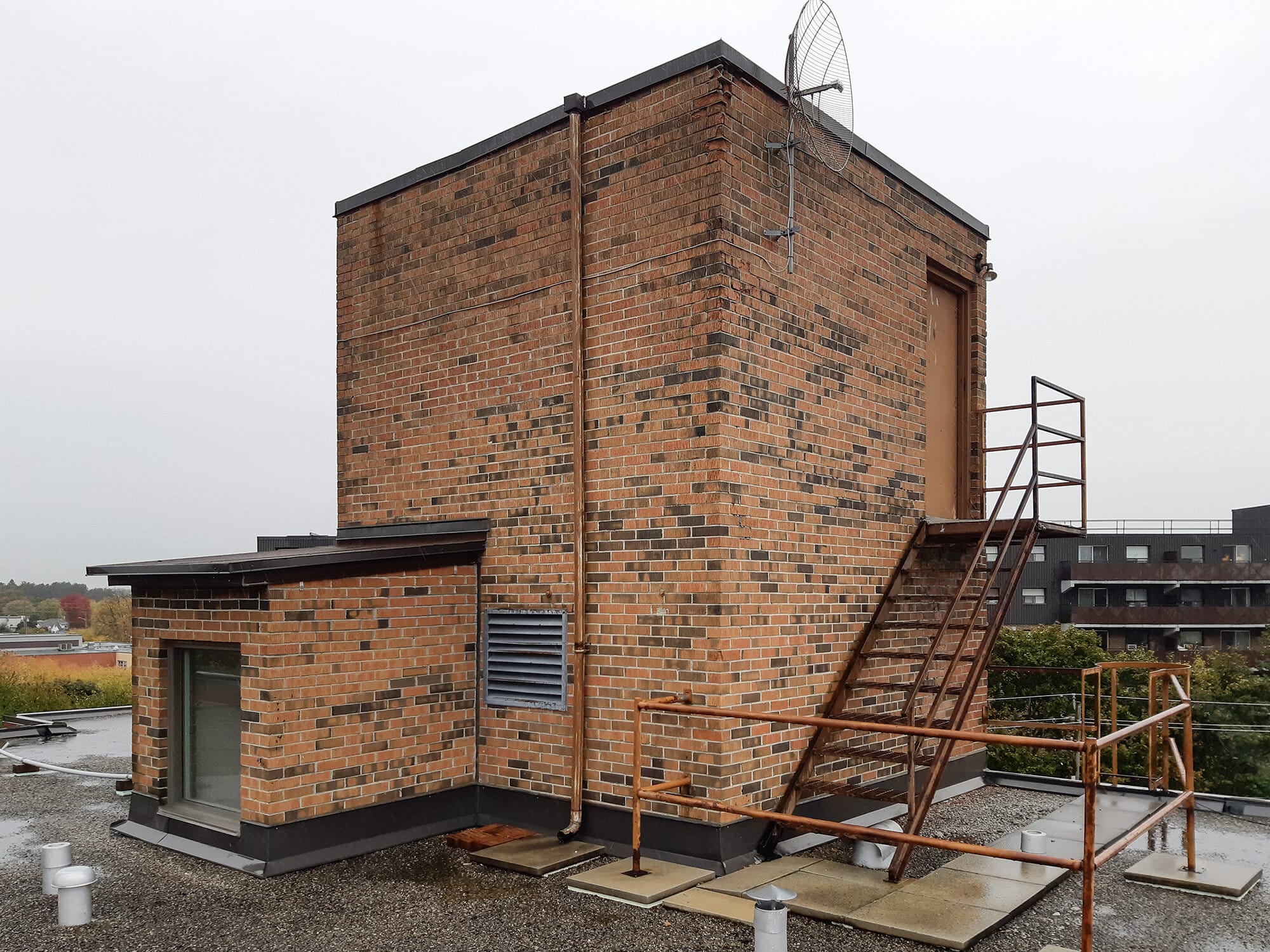 Waterproofing on Brick Elevator Shaft - Oshawa, ON - Videl Roofing Inc